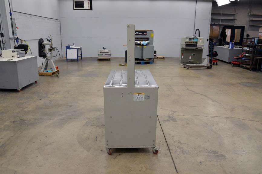 Lot #63: 2004 ITW Packaging (Omega) Strapping Machine - WireBids